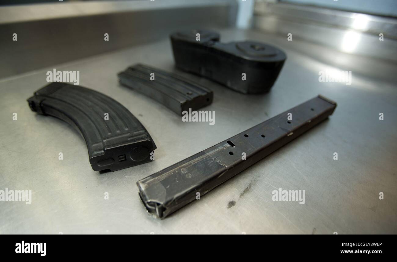 These high-capacity magazines sit on display in the evidence room of ...