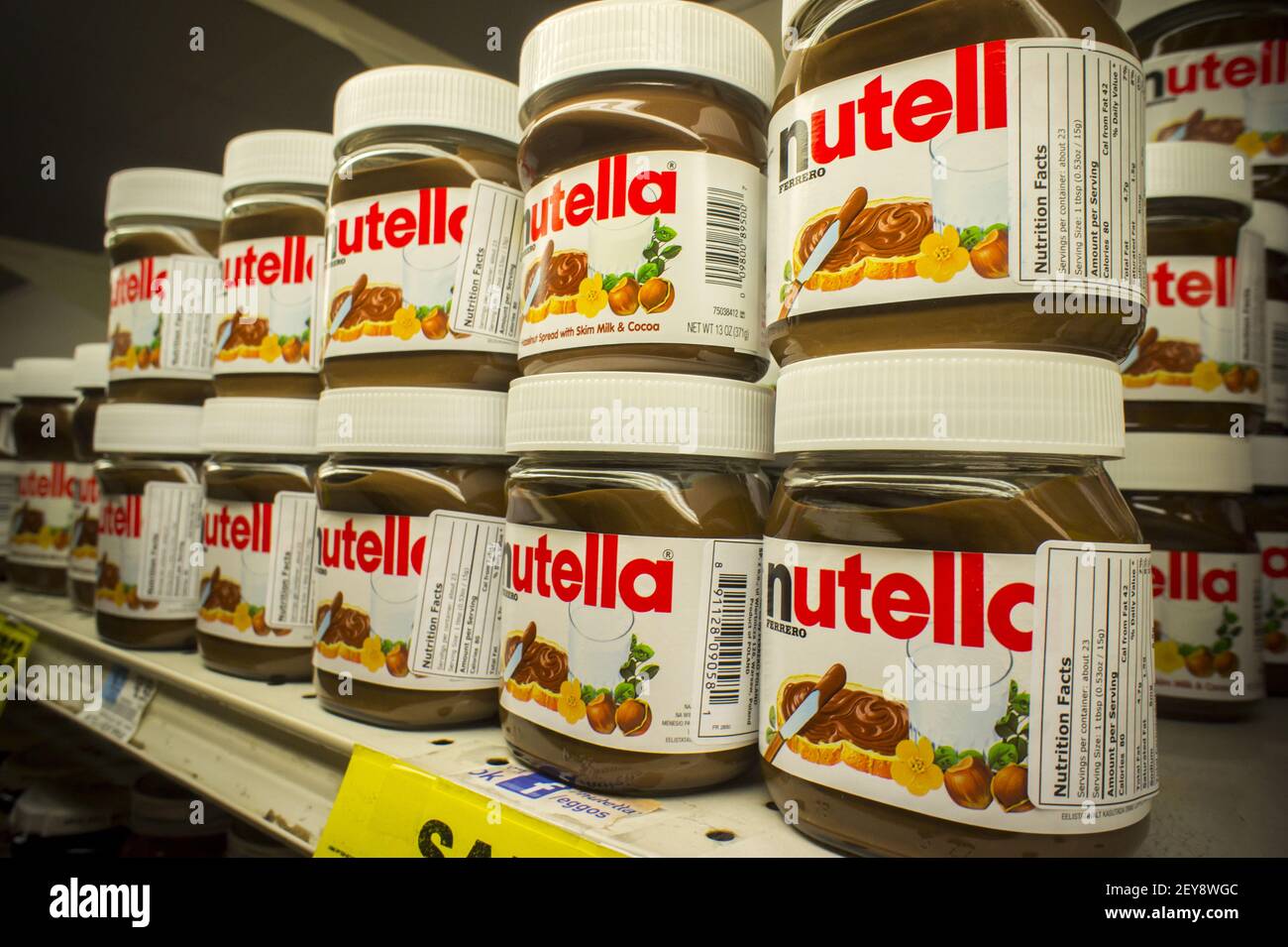 Jars of Nutella chocolate-hazelnut spread are seen on the shelves of a ...