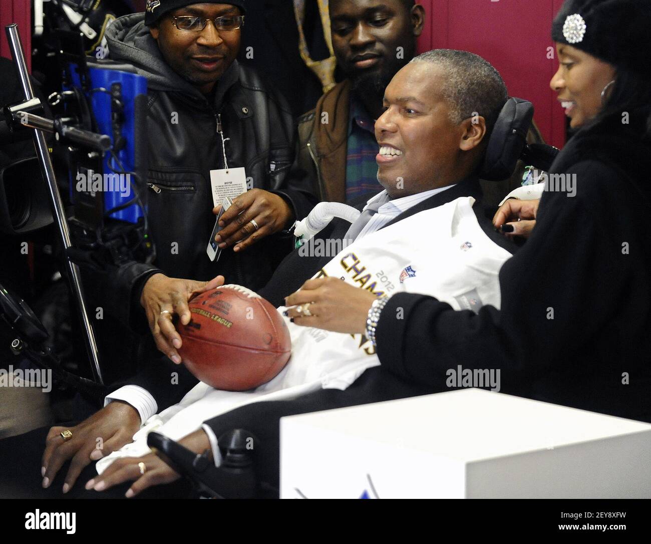 The Baltimore Ravens' O.J. Brigance is given a game ball during a ...