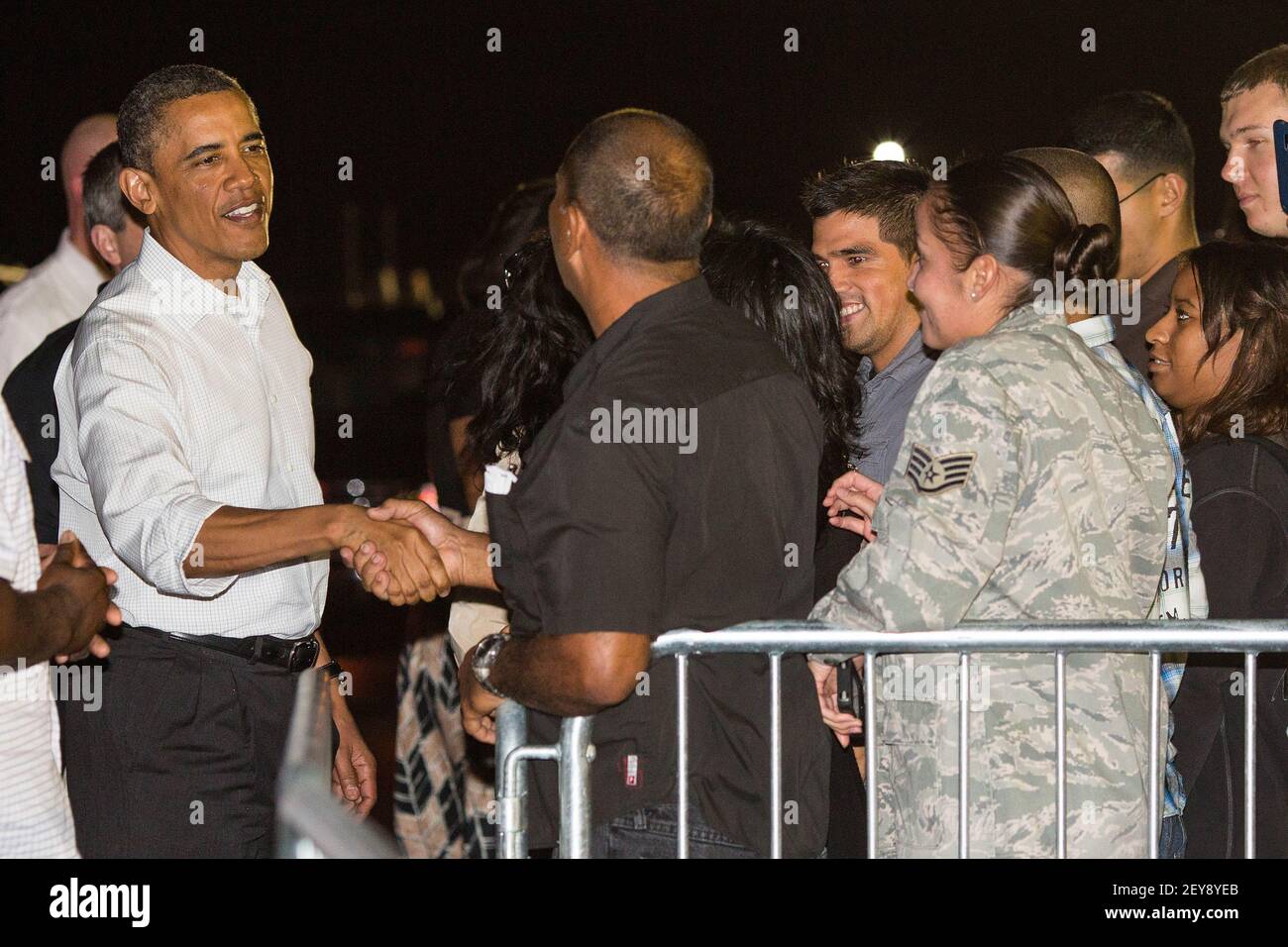 5 January 2013 - Honolulu, HI - US President Barack Obama greets well ...