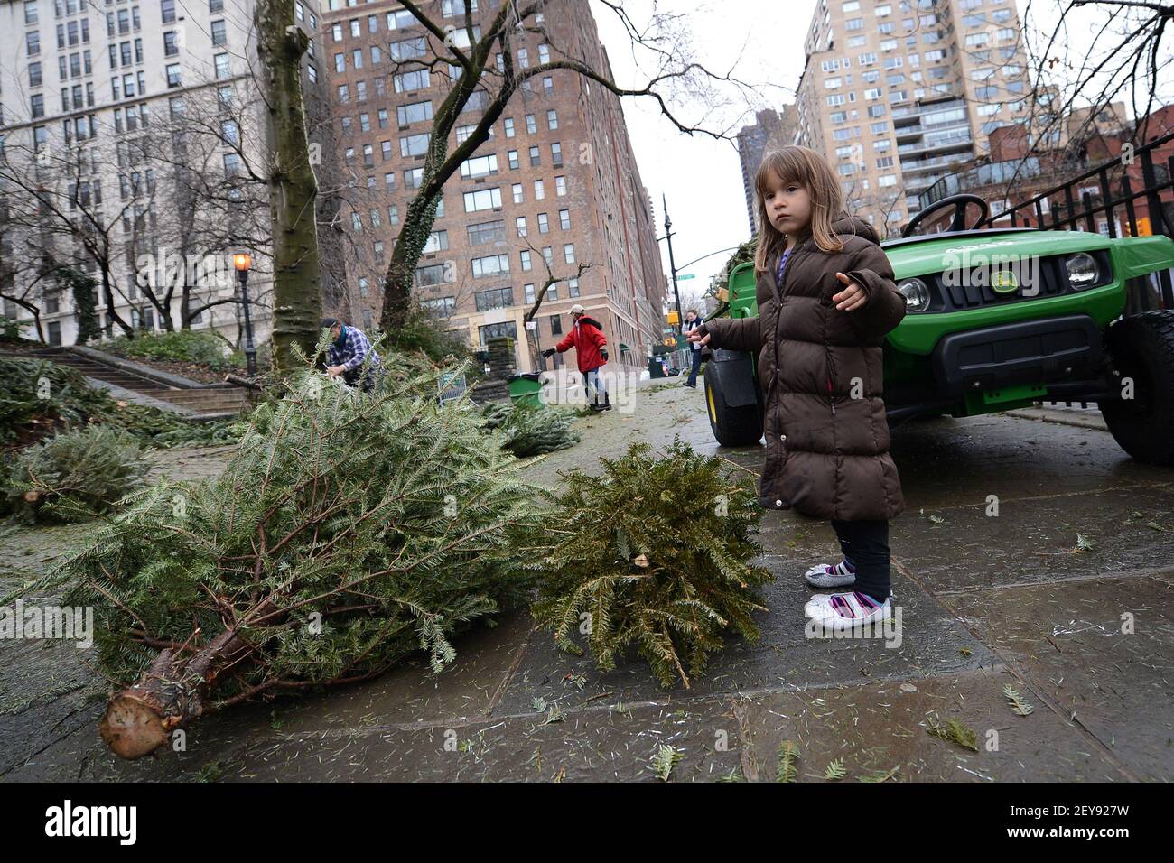 12 JANUARY 2013 - New York - Six year old Zara Tafoya helps remove ...