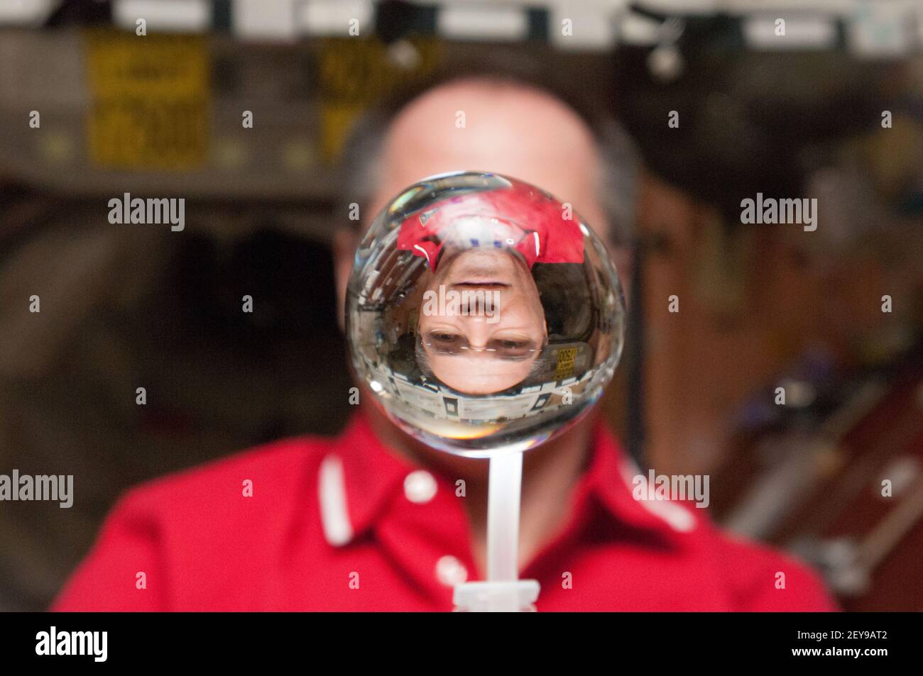 NASA astronaut Kevin Ford, Expedition 34 commander, watches a water ...