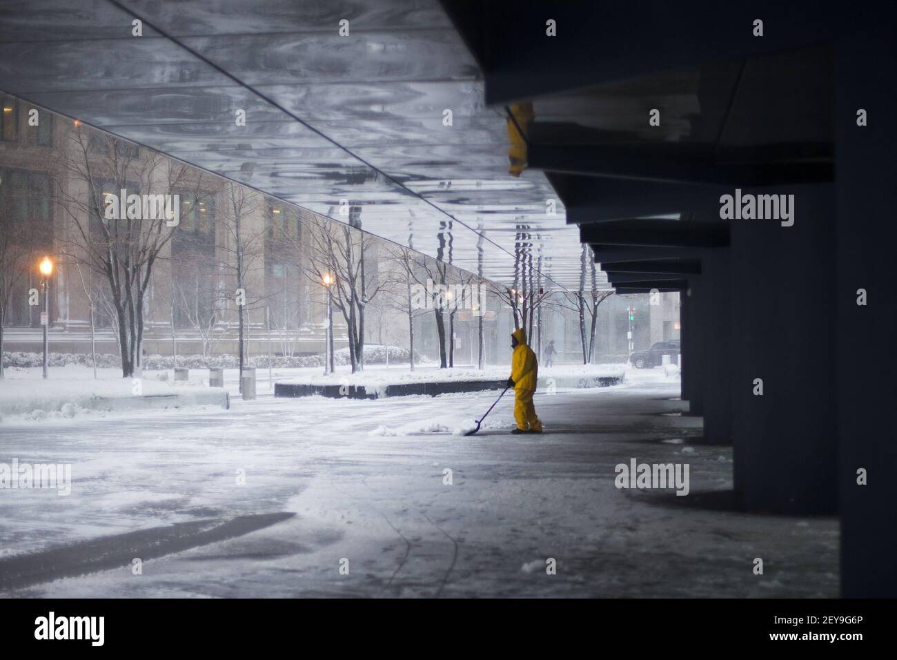 7 February 2013 - Boston, MA - A man is shoveling the snow on Clarendon ...