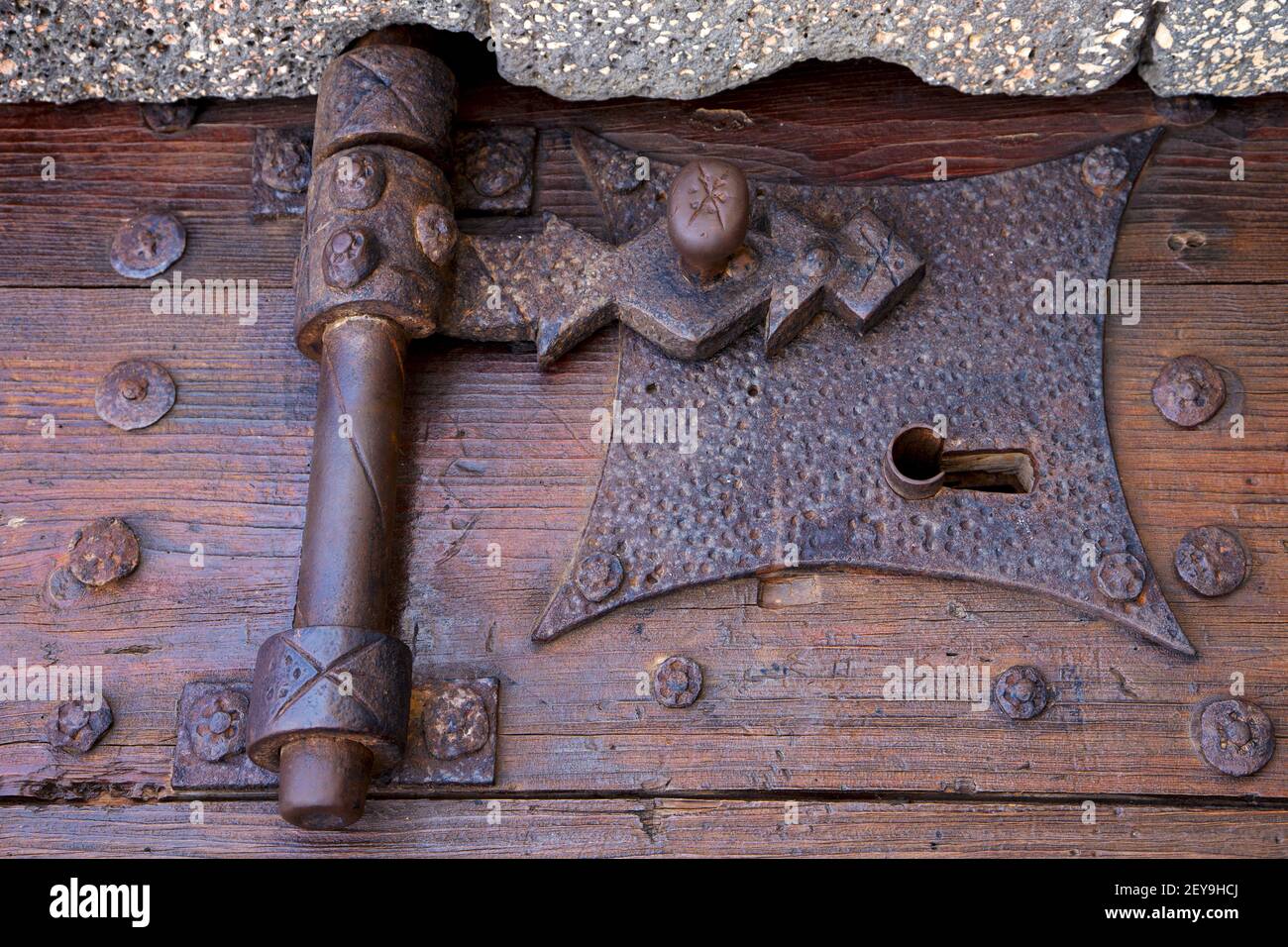 Castle lock spain knocker Stock Photo - Alamy