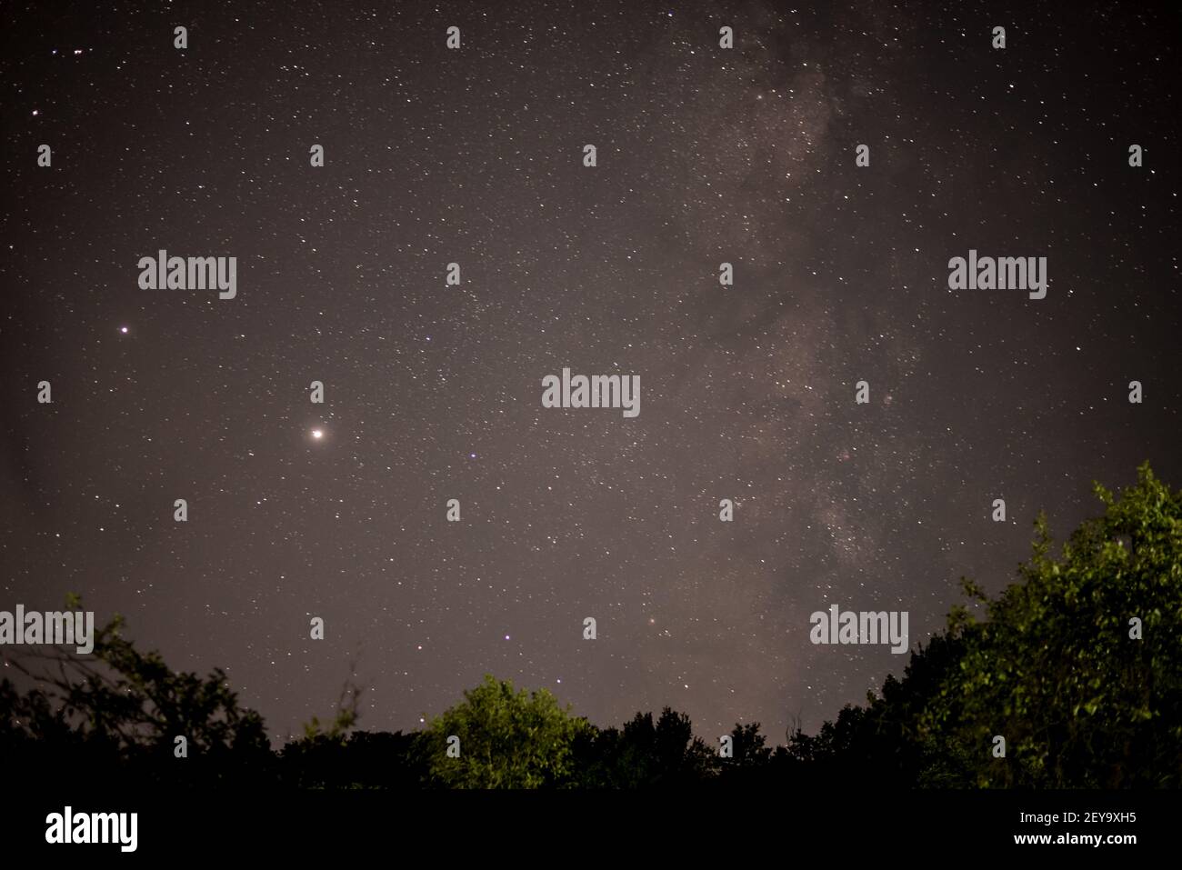 An amazing view of the summer night sky with milky way galaxy shining ...