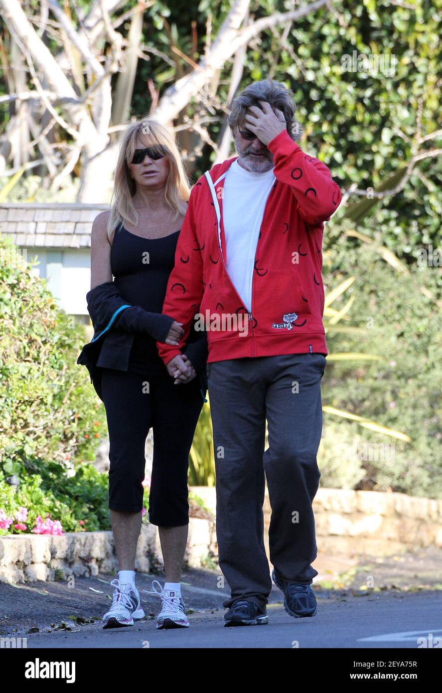 Feb 25, 2013 - Los Angeles, CA - Goldie Hawn and her longtime partner Kurt Russell taking a walk ...