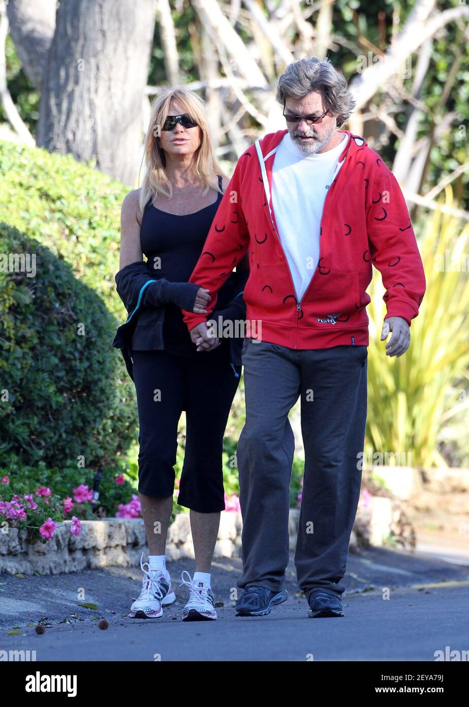Feb 25, 2013 - Los Angeles, CA - Goldie Hawn and her longtime partner Kurt Russell taking a walk ...