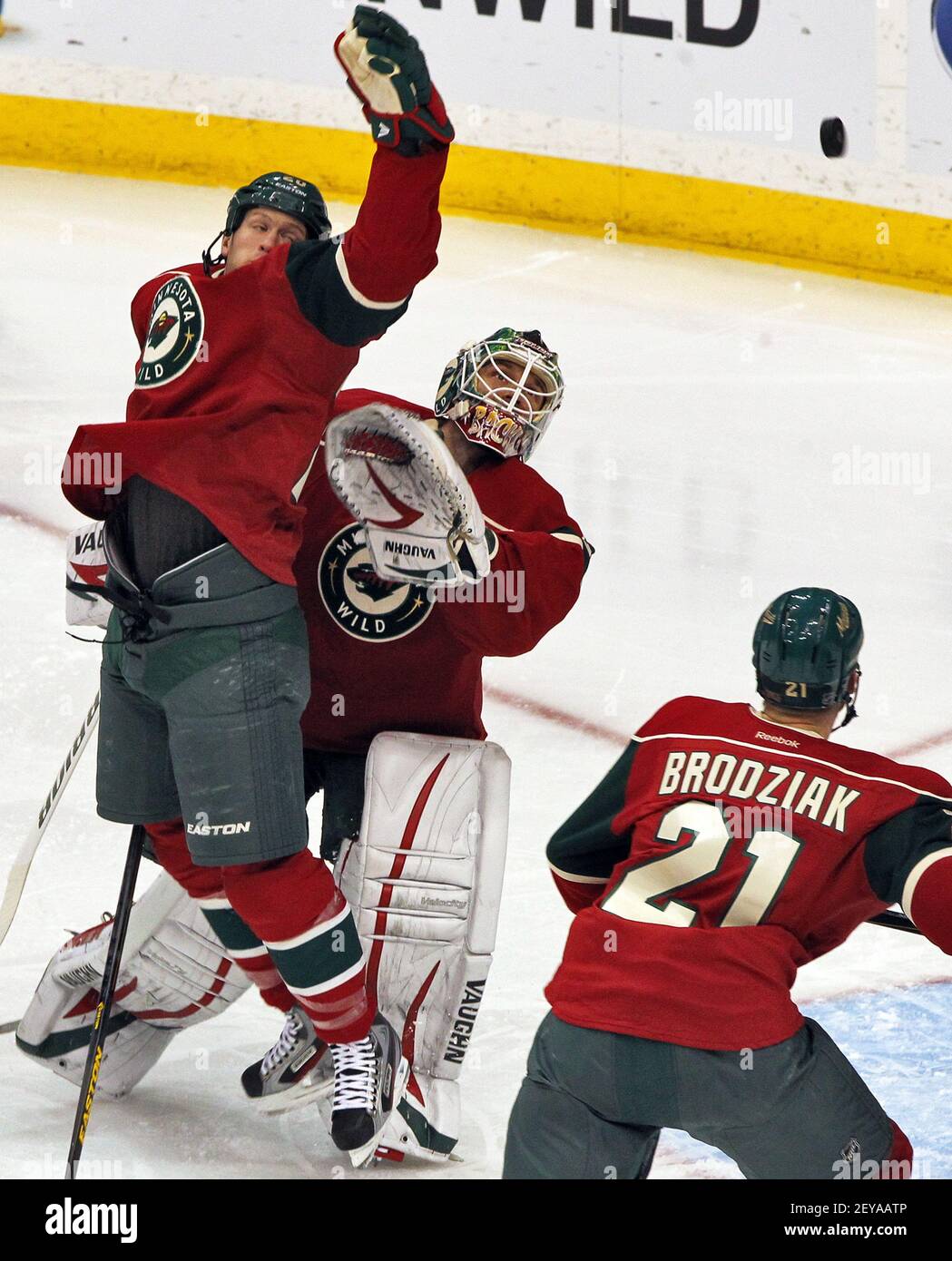 Minnesota Wild goalie Niklas Backstrom gets a little help on an ...