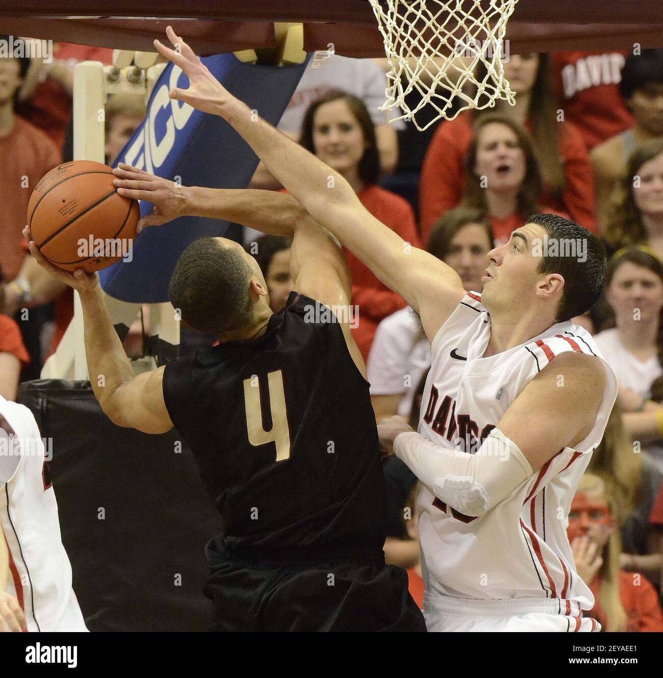 Davidson's Jake Cohen (15) blocks a shot by Charleston's Andrew ...