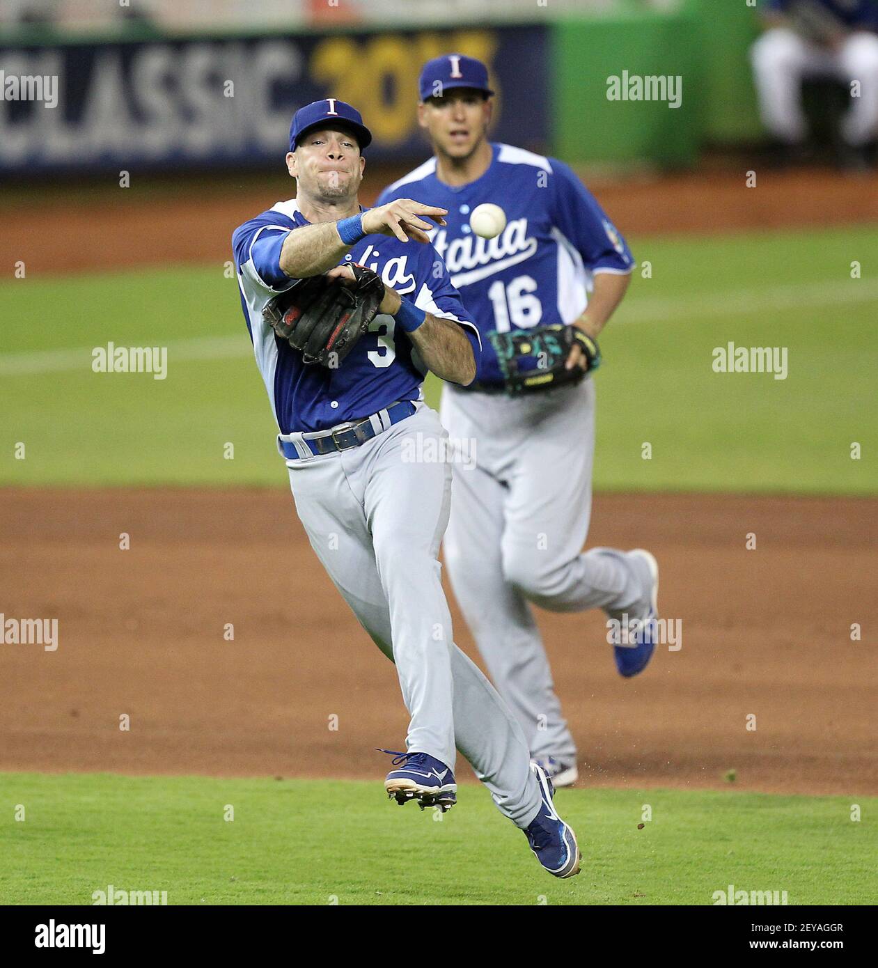 Italy shortstop Anthony Granato throws to first base to put out Puerto ...