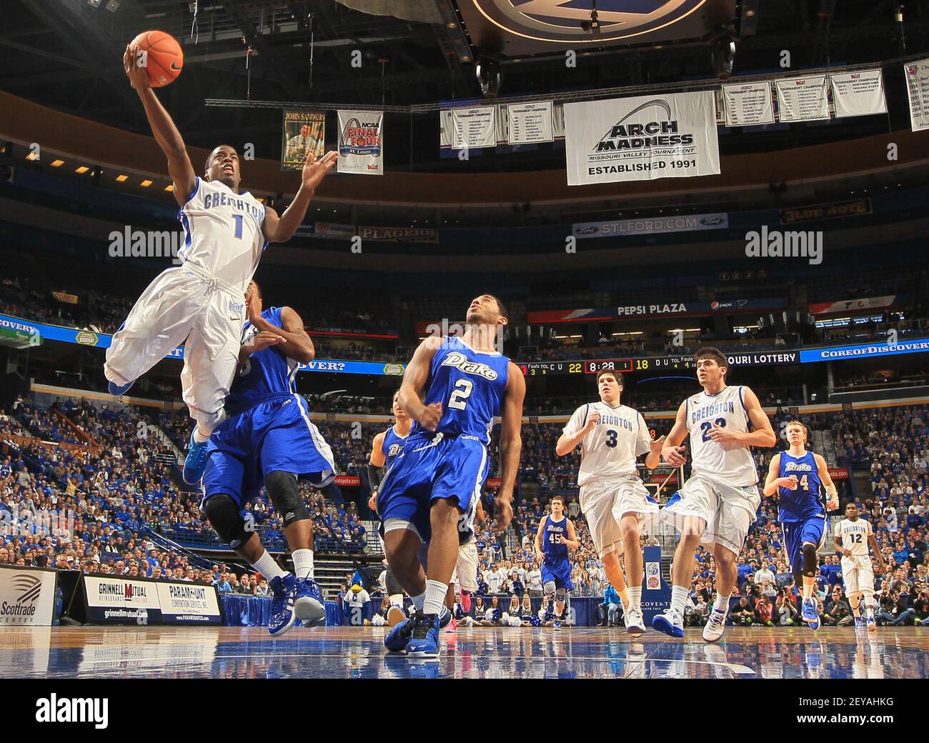 Austin Chatman of Creighton goes up for a shot against Drake in their ...