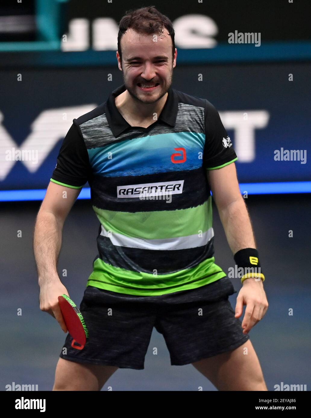 Doha. 5th Mar, 2021. Simon Gauzy of France reacts during the men's ...