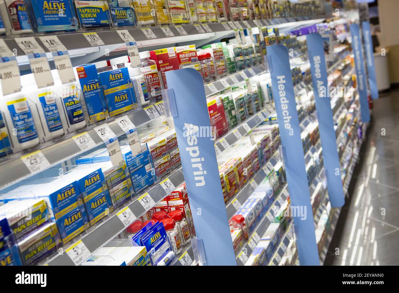 Aspirin products on display in the pharmacy section of the new ...