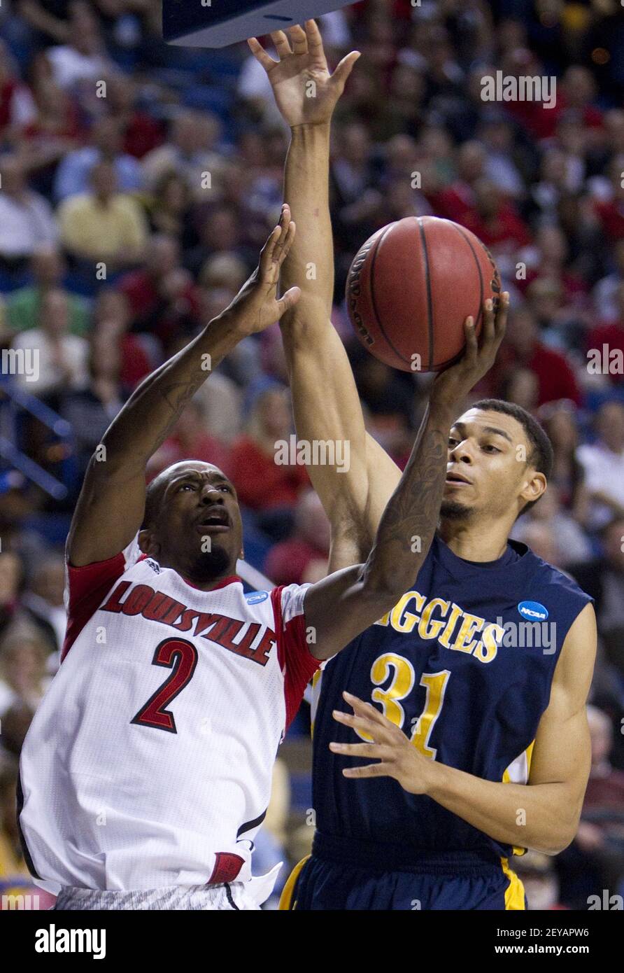 Louisville's Russ Smith (2) gets a step on North Carolina A&T's Austin ...