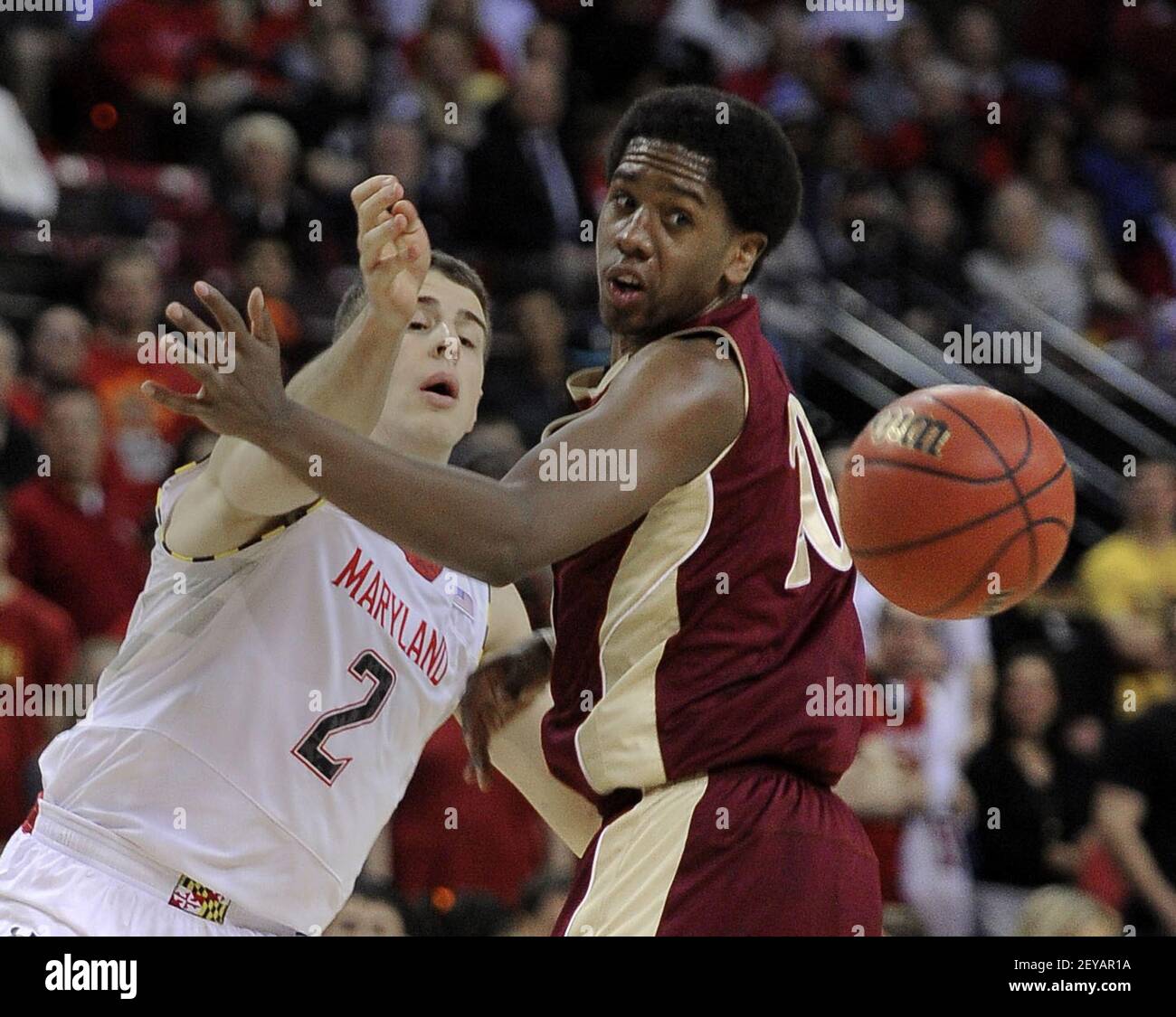 Maryland's Logan Aronhalt gets his pass off around the defense of ...