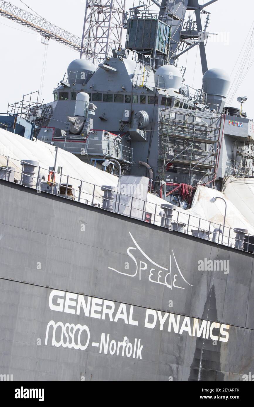 An Arleigh Burke class destroyer can be seen in a repair dry dock at the General Dynamics NASSCO ...