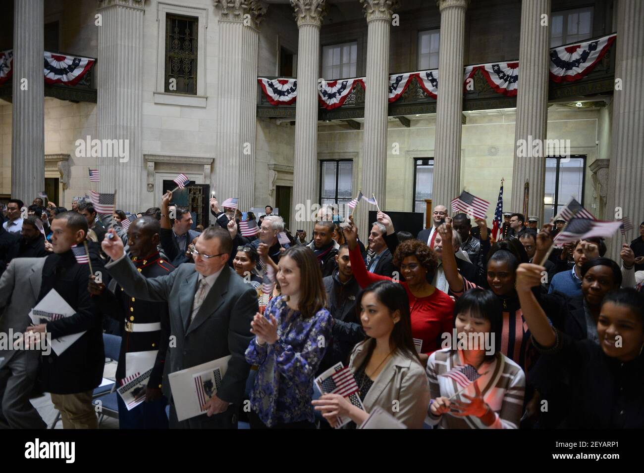 Immigrants celebrate becoming U.S. Citizens during a U.S. Citizenship ...