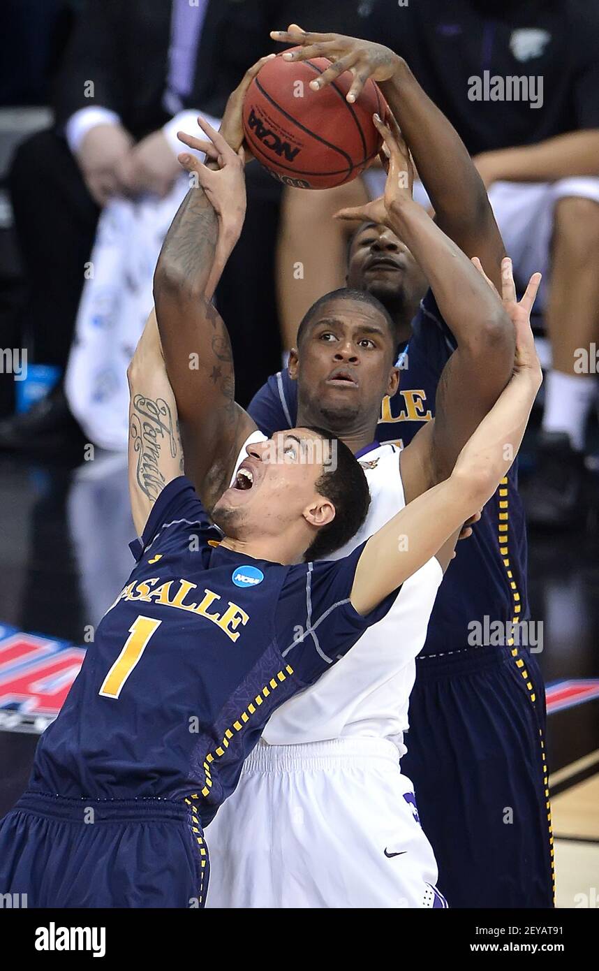Kansas State Wildcats forward Jordan Henriquez (21) gets fouled under ...