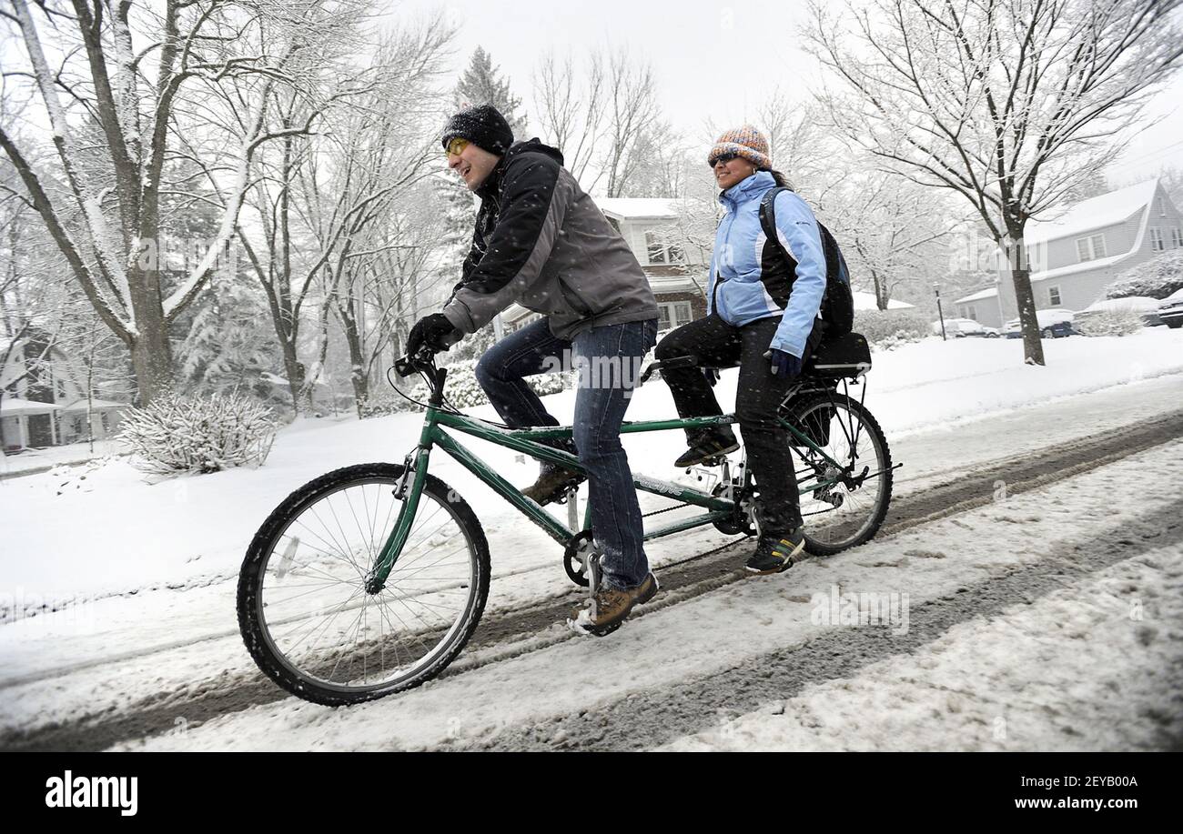 Penn State students David Leinbach, left, and Samantha Rosado ride a ...