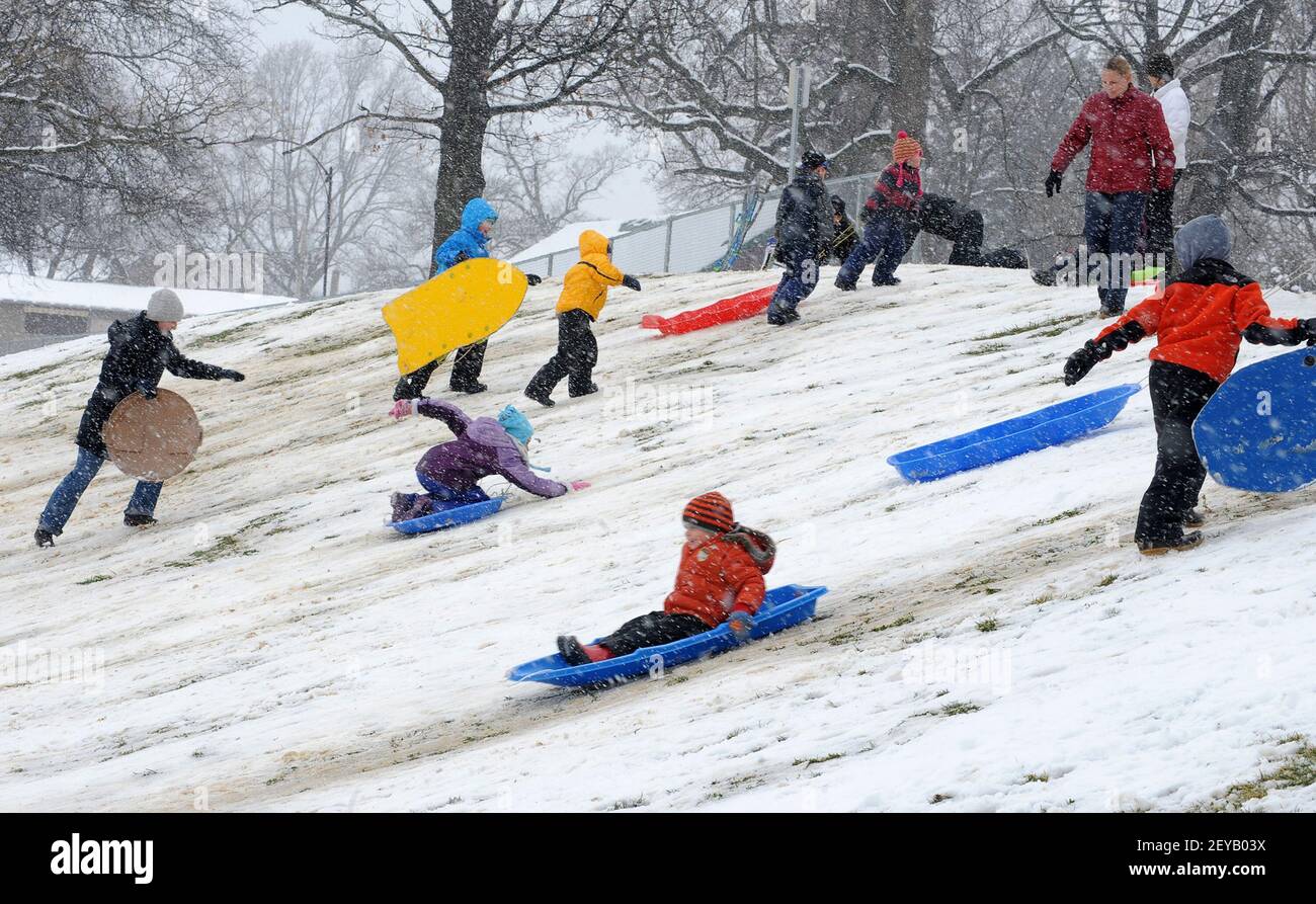 Teddy Werden, 3, foreground center, is surrounded by sled riders of all ...
