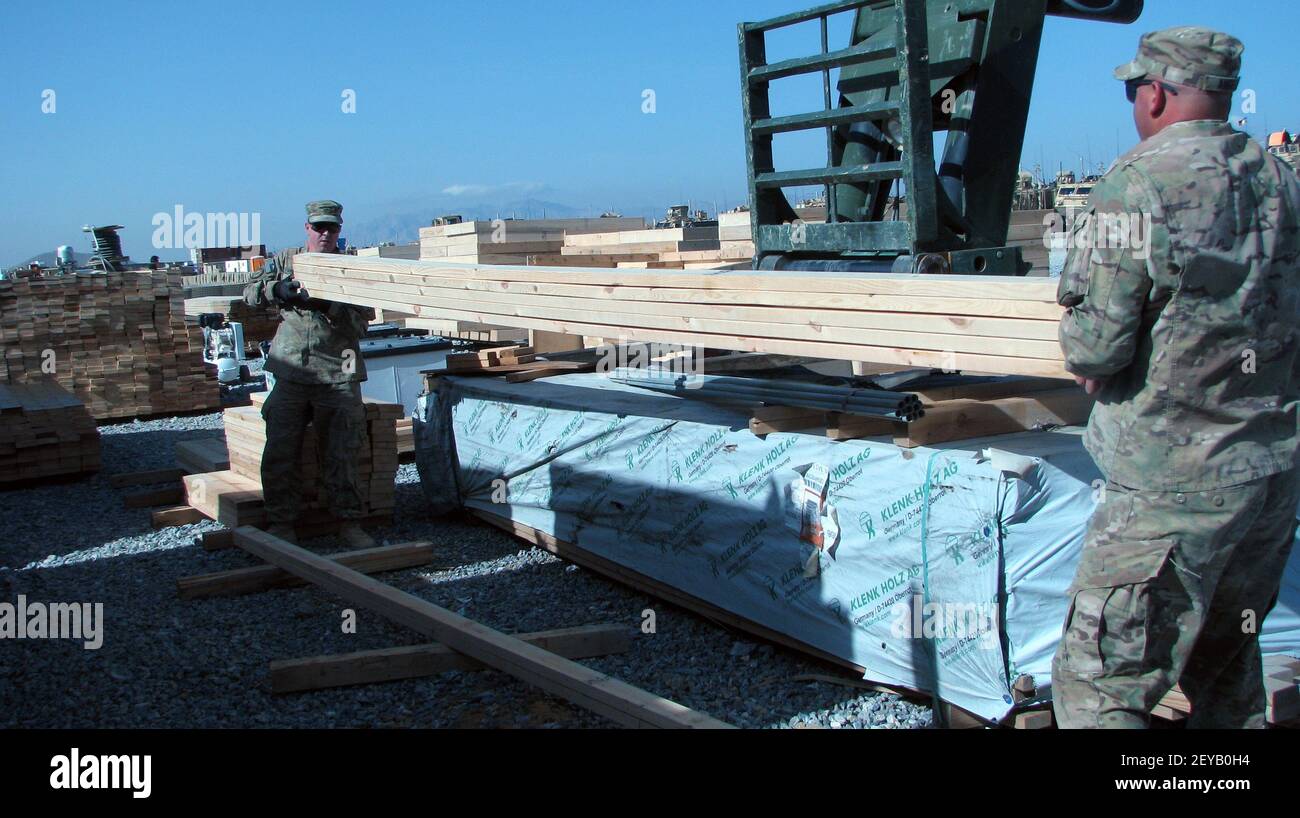 Feb 27, 2013 - QALAT, - U.S. soldiers load wood onto a for truck for ...