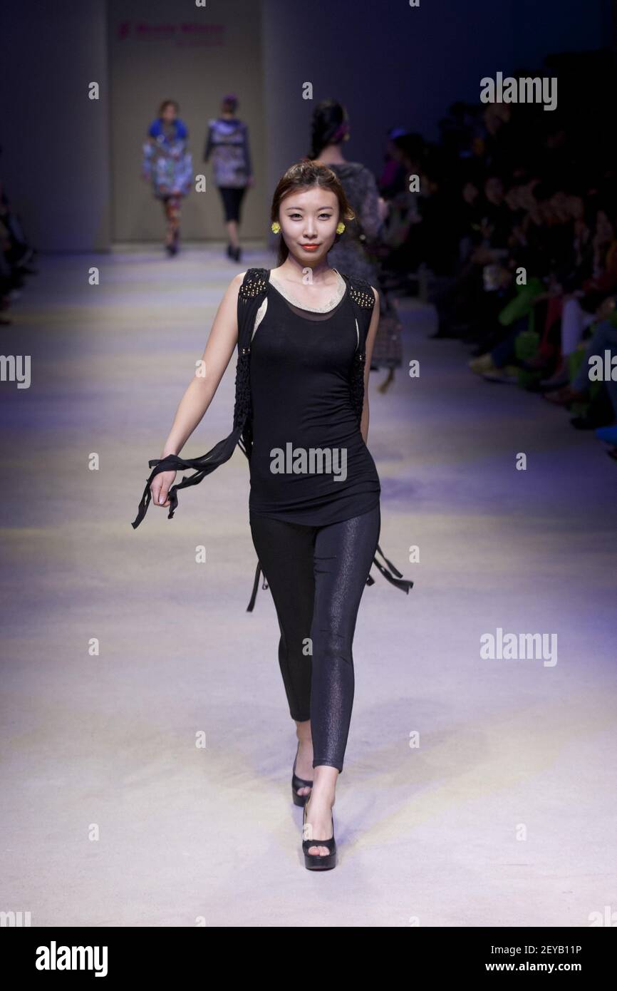 A model wears a creation by South Korean designer Sylvia Oh during a ...
