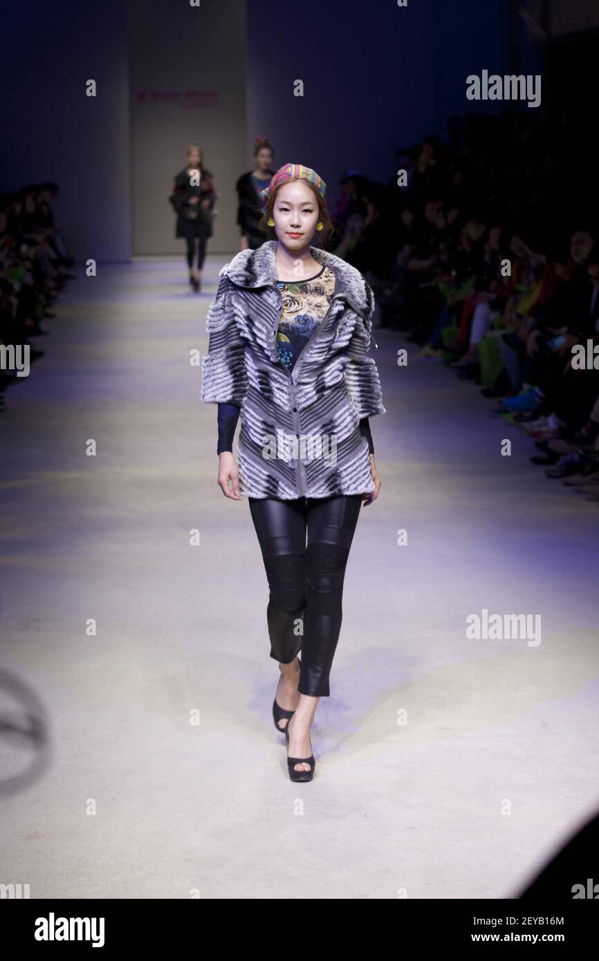 A model wears a creation by South Korean designer Sylvia Oh during a ...