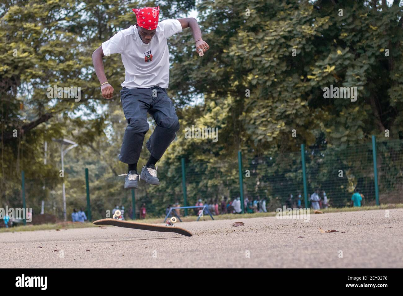 red pair of shoe on a yellow background with a cast of very subtle ...