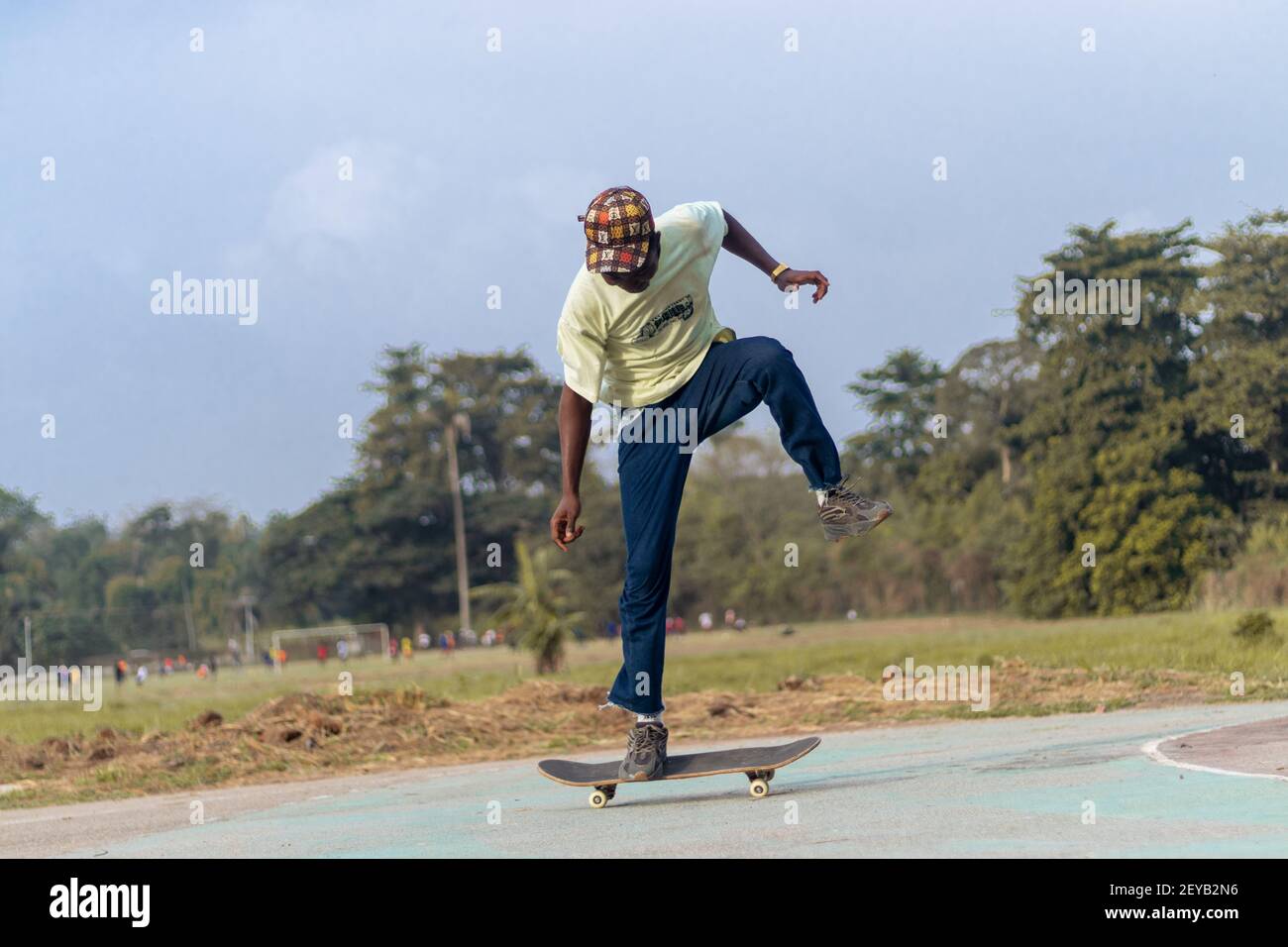 red pair of shoe on a yellow background with a cast of very subtle ...