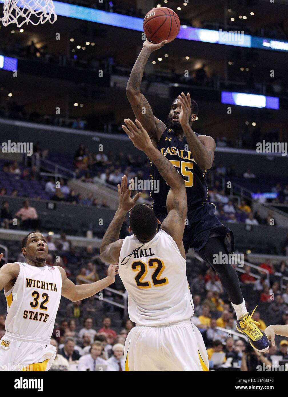 La Salle's Ramon Galloway charges into Wichita State's Carl Hall (22 ...