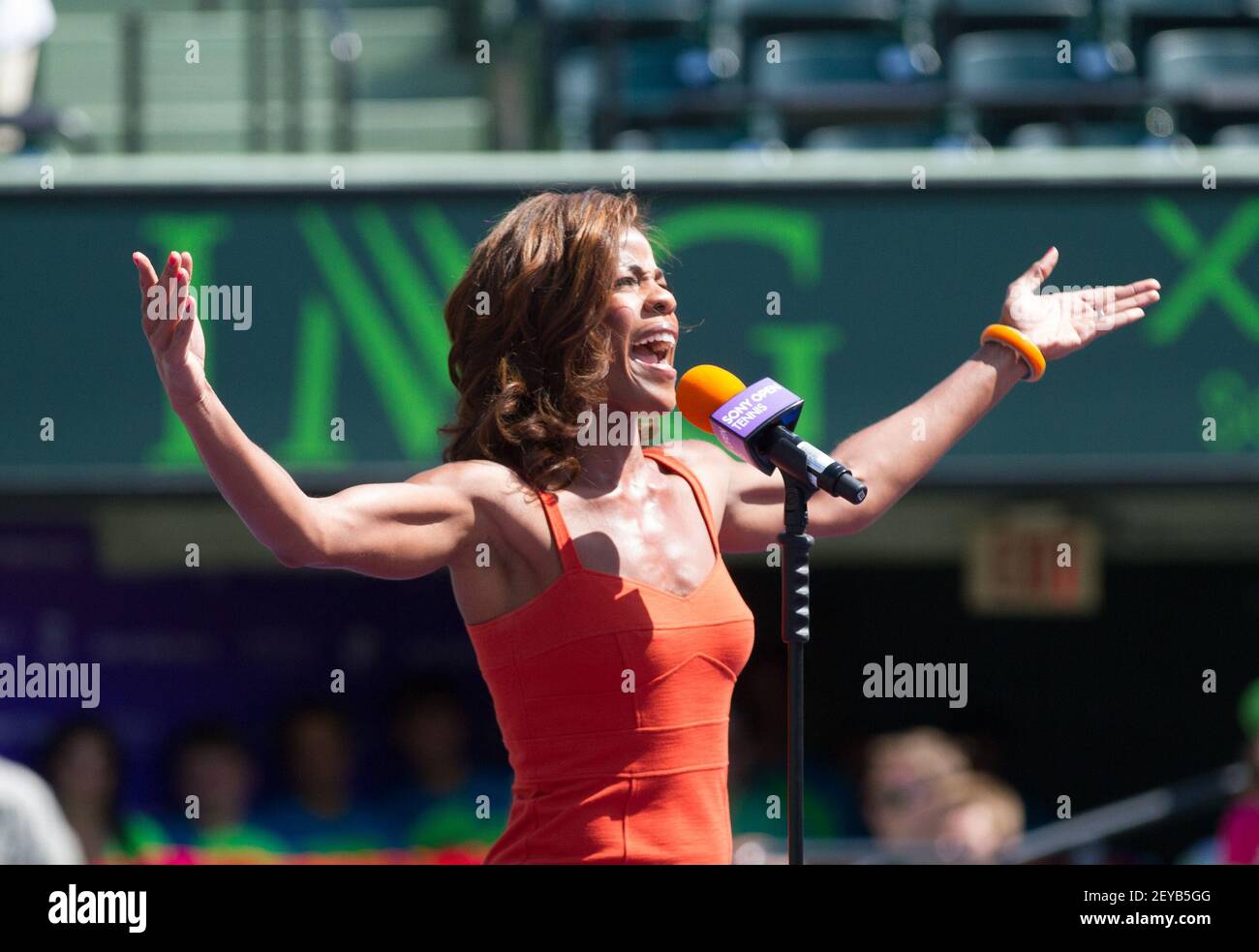 KEY BISCAYNE, FL - MARCH 31: Nichole Henry sings the National Anthem at ...