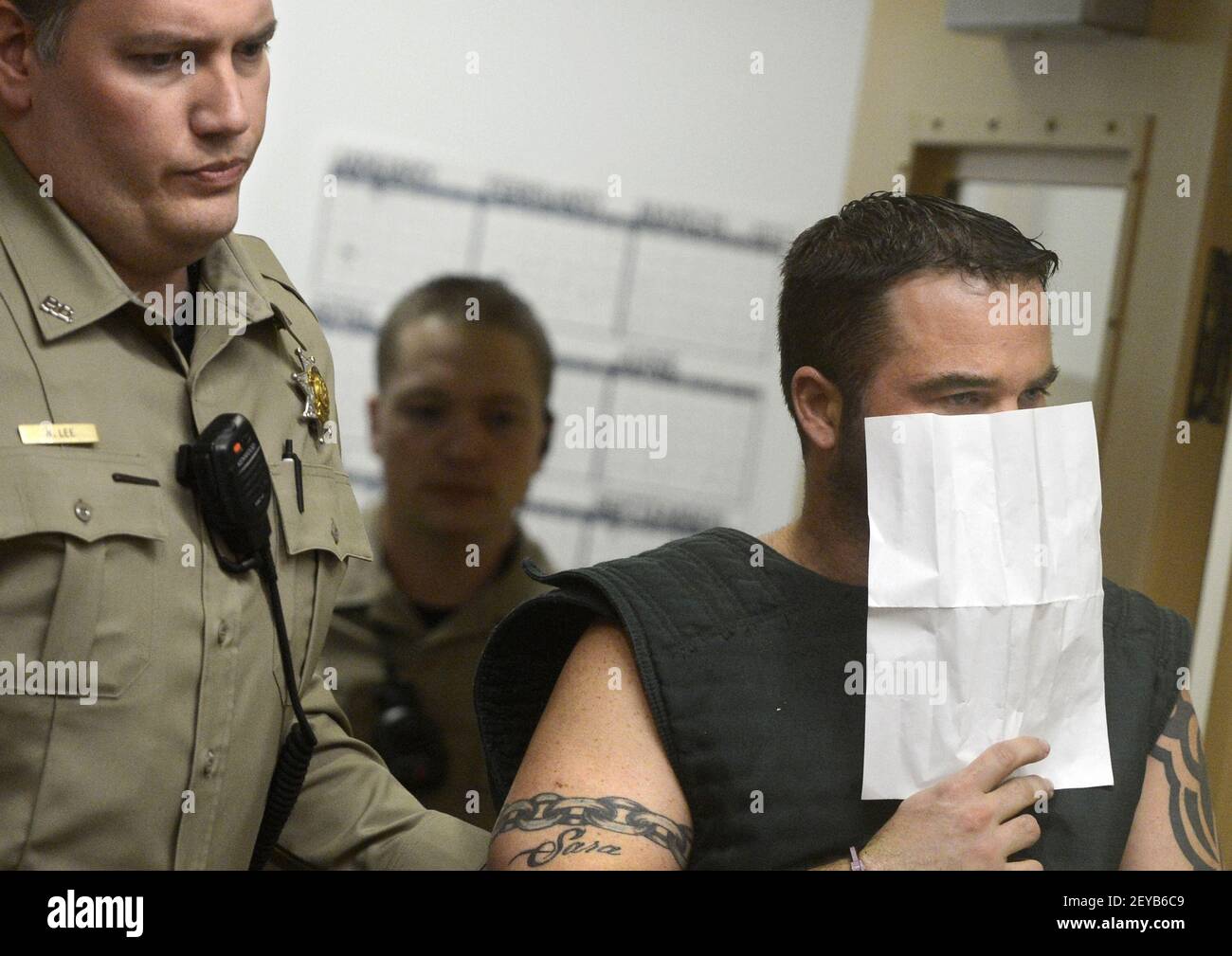 Tony Barrett enters court for his arraignment hearing after being ...