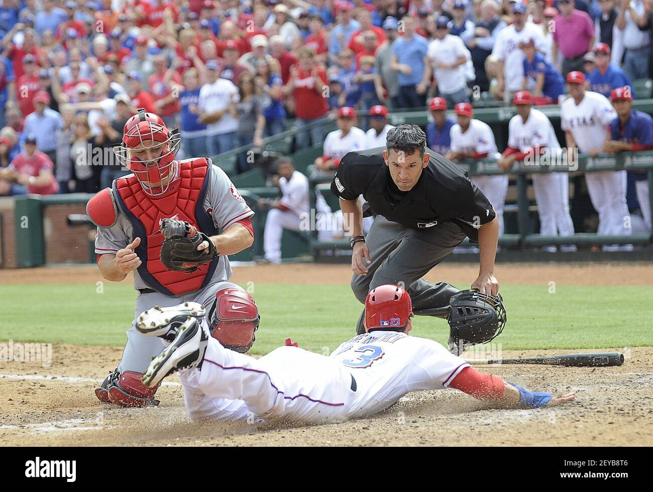 Texas Rangers center fielder Craig Gentry (23) slides safely at home ...