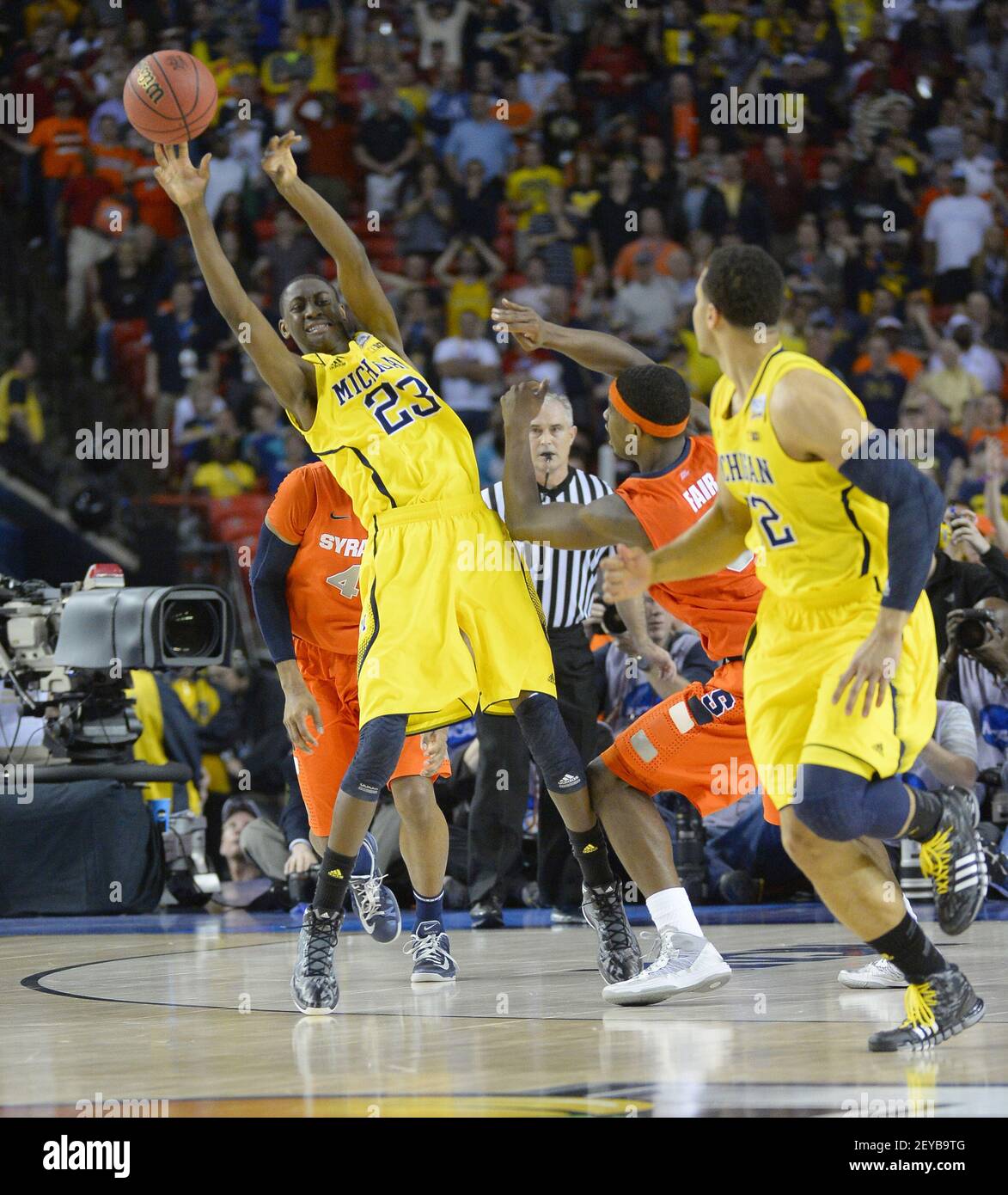 Caris LeVert (23) of the Michigan Wolverines makes a pass down court ...