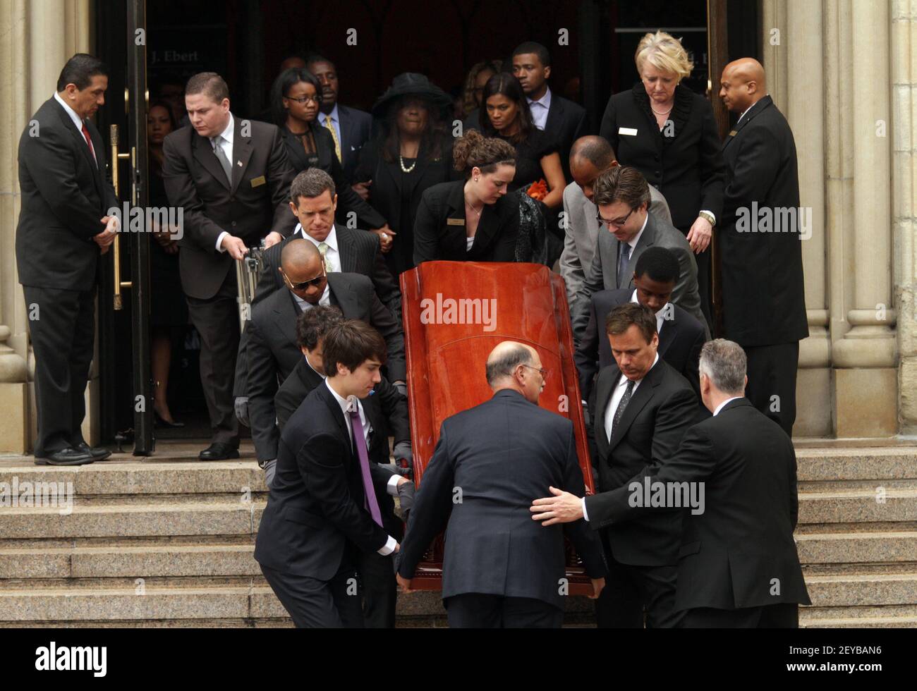 Roger Ebert's wife Chaz Hammelsmith Ebert, center, watches as ...