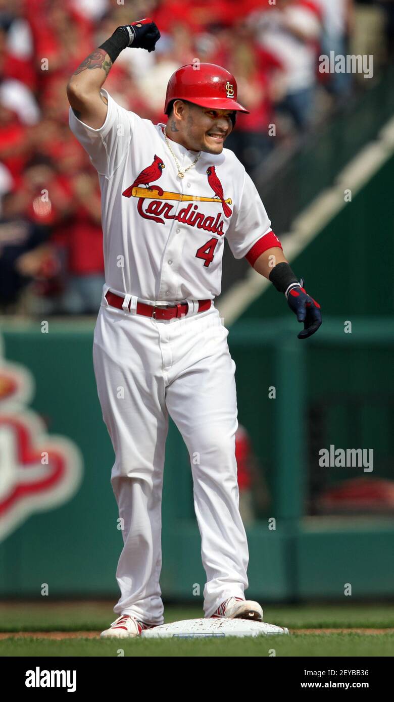 St. Louis Cardinals catcher Yadier Molina celebrates driving two runs ...