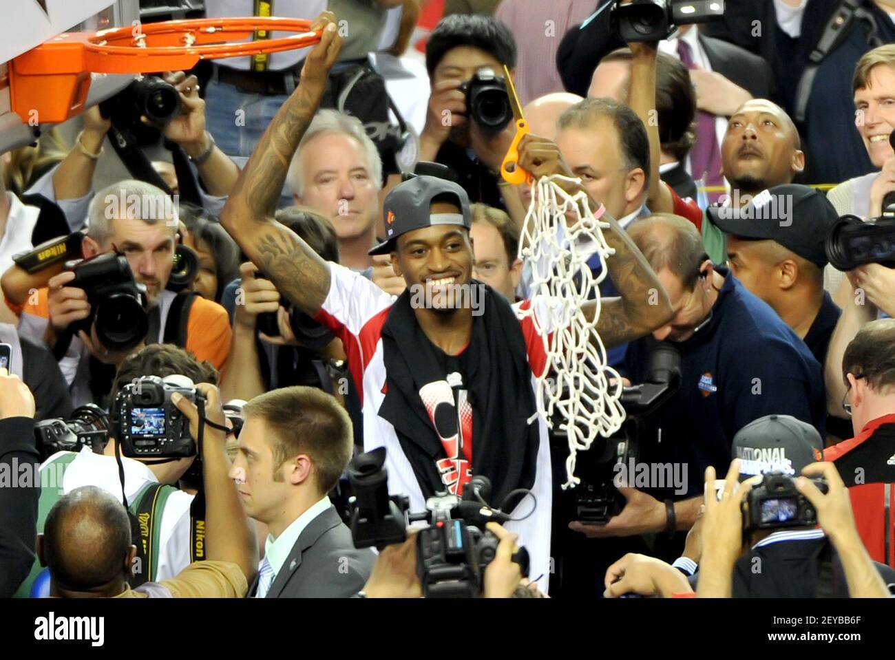 Louisville Cardinals guard Kevin Ware poses for photographers after he ...