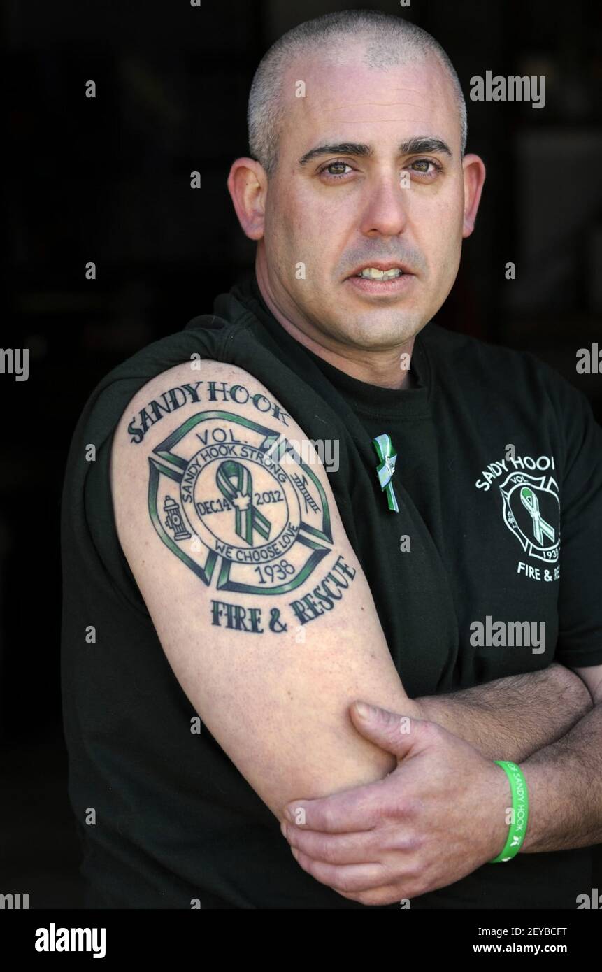 Newtown volunteer firefighter Peter Barresi got a tattoo to remember ...