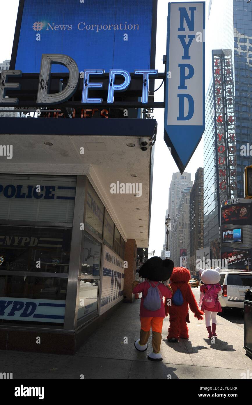 "Dora the Explorer", "Elmo" and "Hello Kitty" costumed impersonators ...