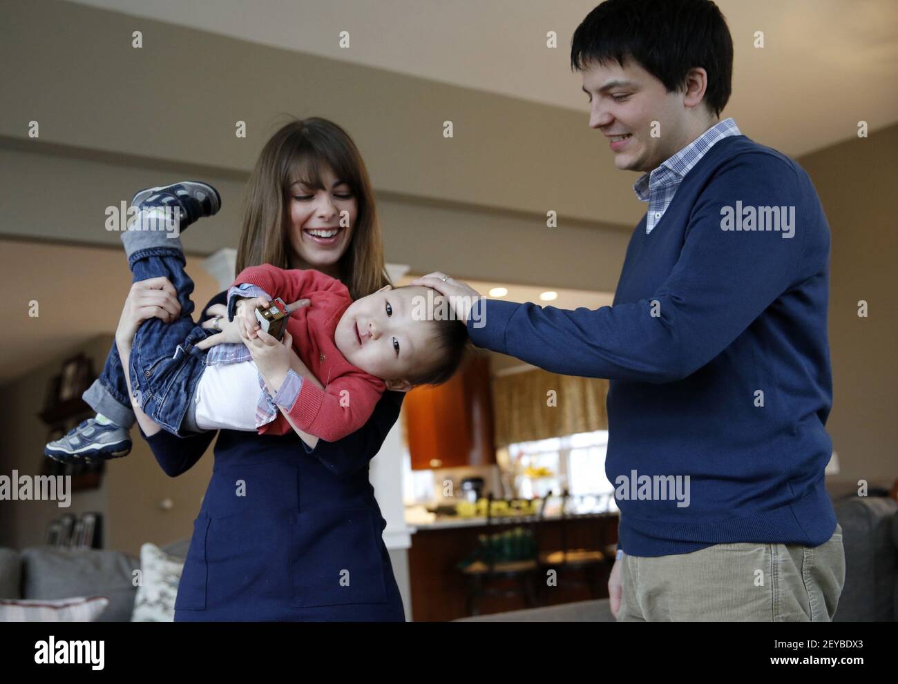 Overseas adoption was a three-year process for Tom and Kara Chlebek, of Chicago, Illinois, with ...