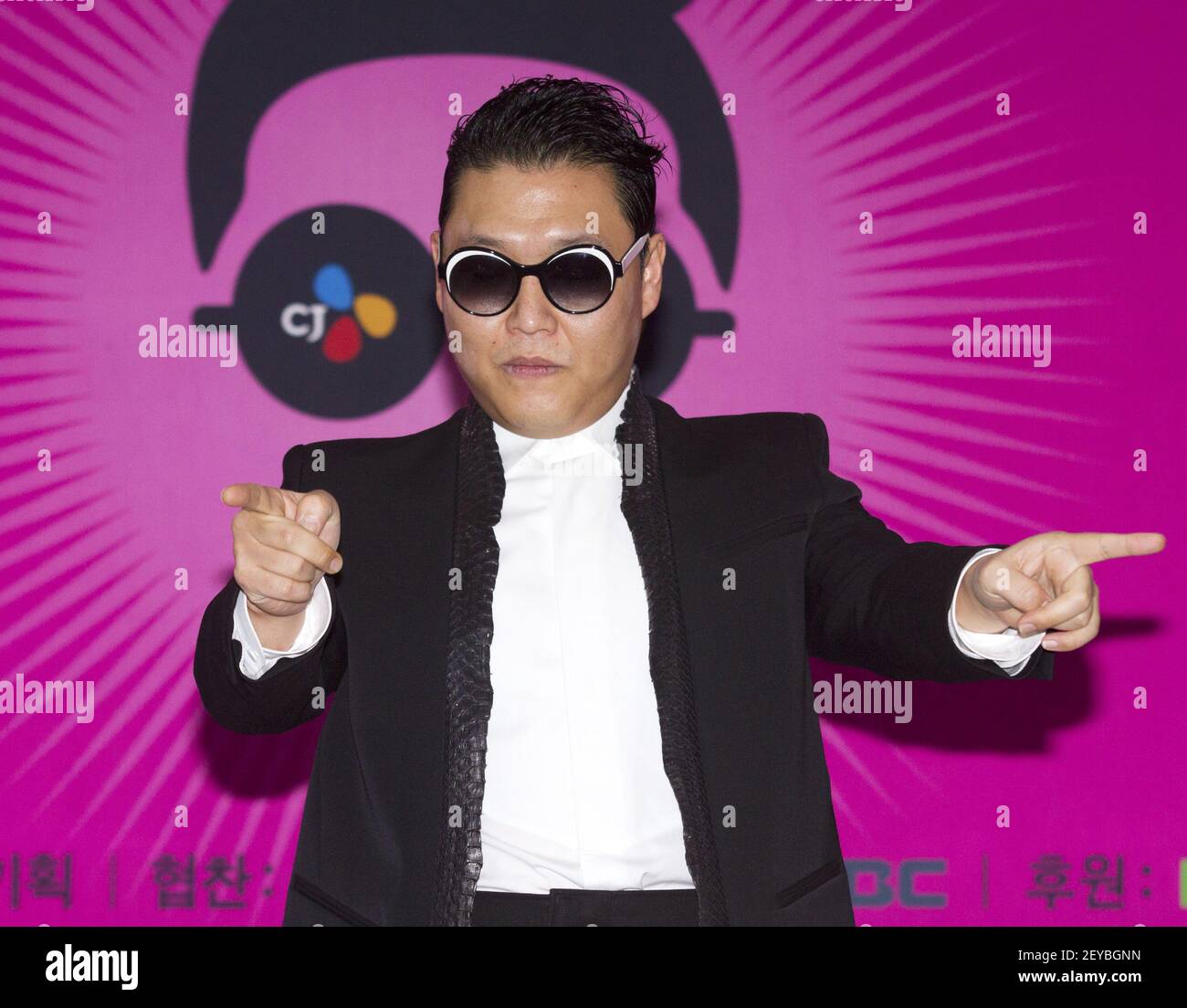 South Korean singer Psy attends a press conference to promote his new ...