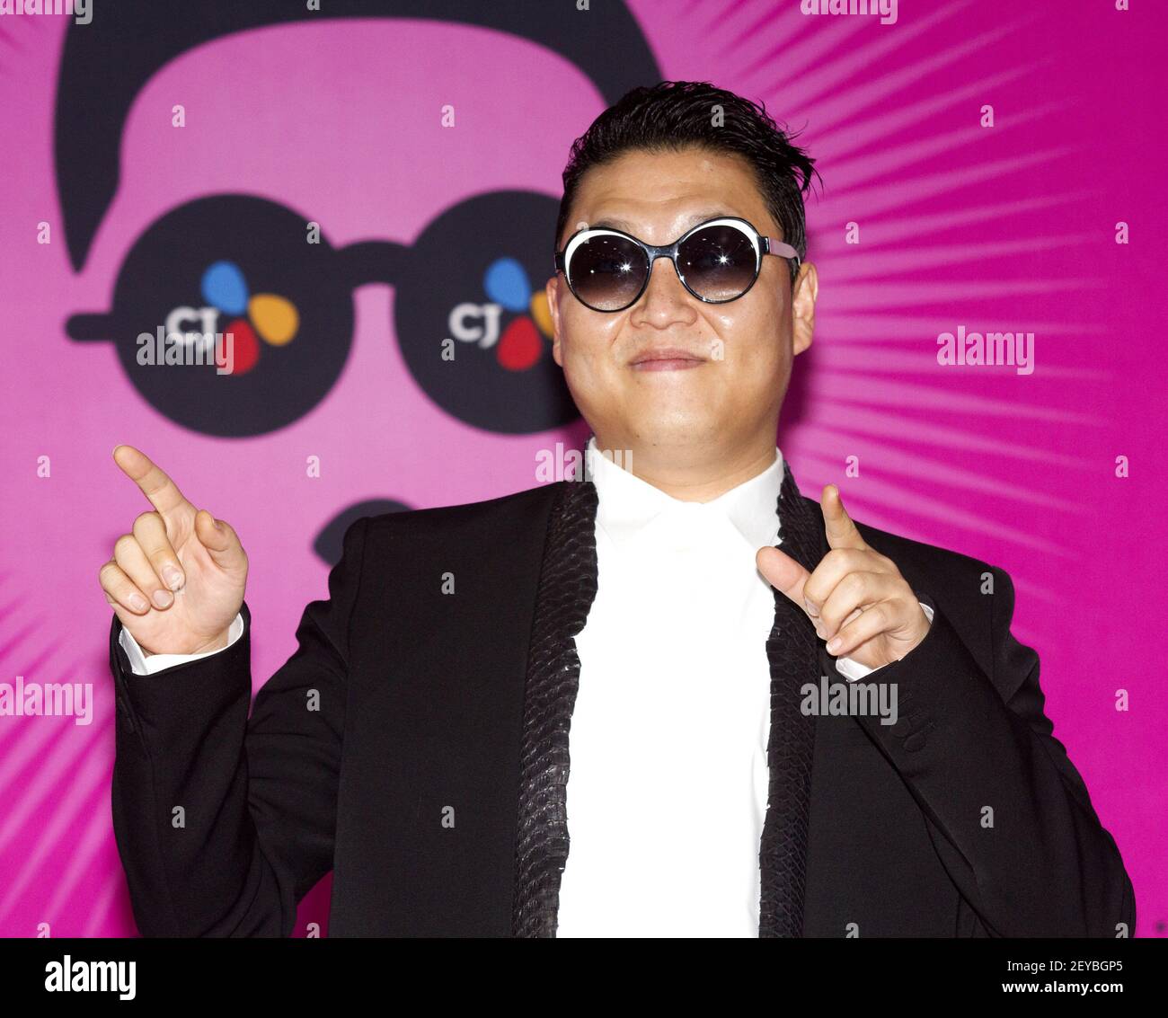 South Korean singer Psy attends a press conference to promote his new ...