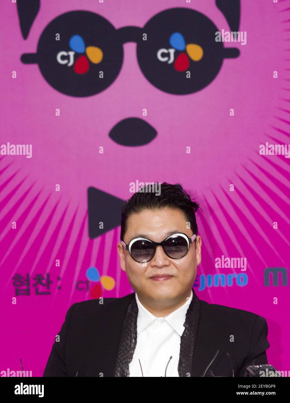 South Korean singer Psy attends a press conference to promote his new ...