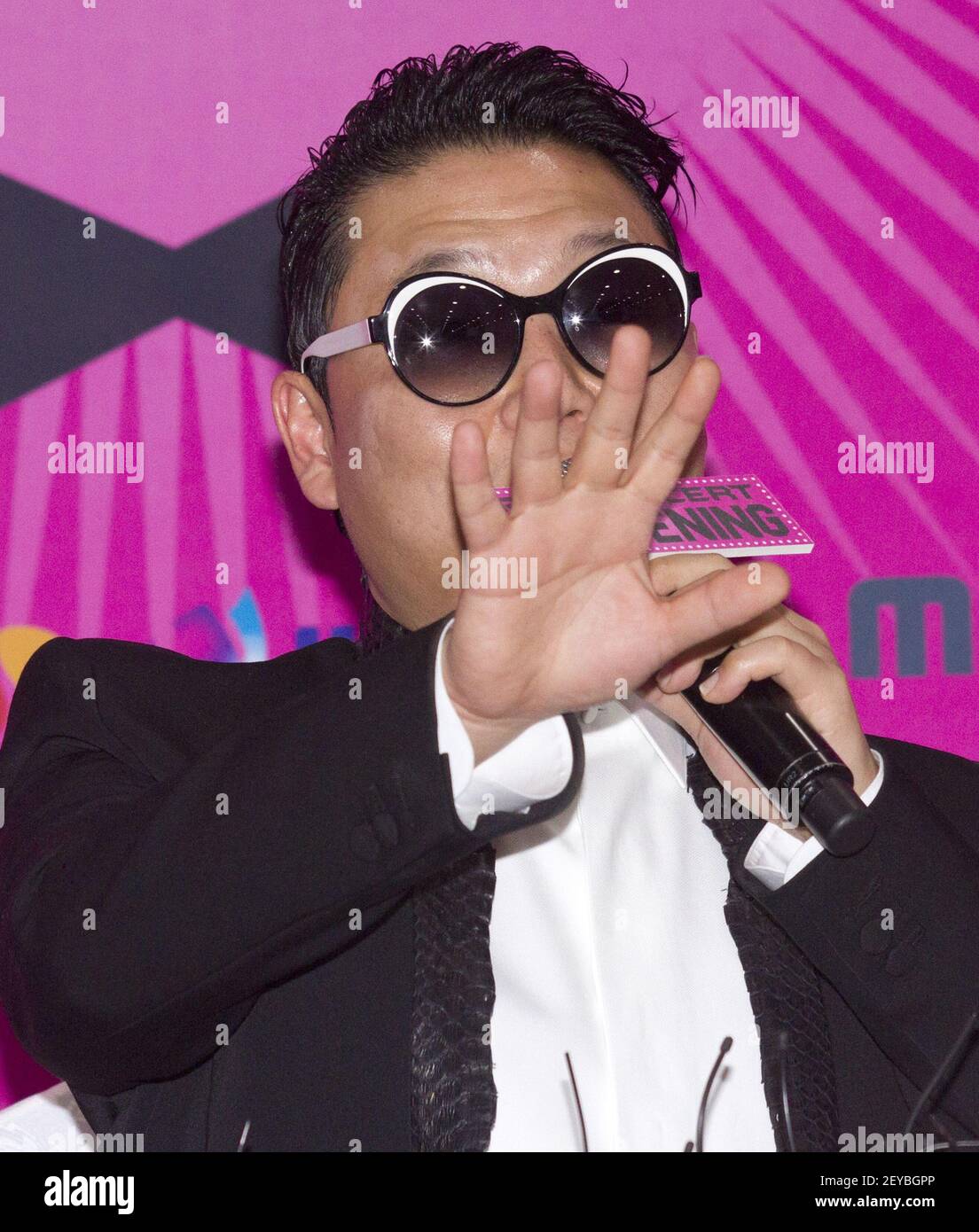 South Korean singer Psy attends a press conference to promote his new ...