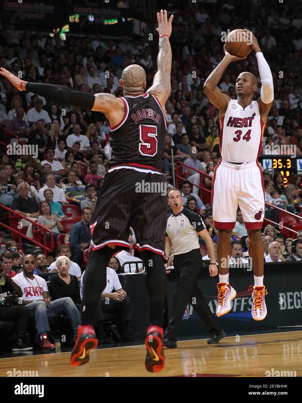 Ray Allen of the Miami Heat shoots over Carlos Boozer of the Chicago ...