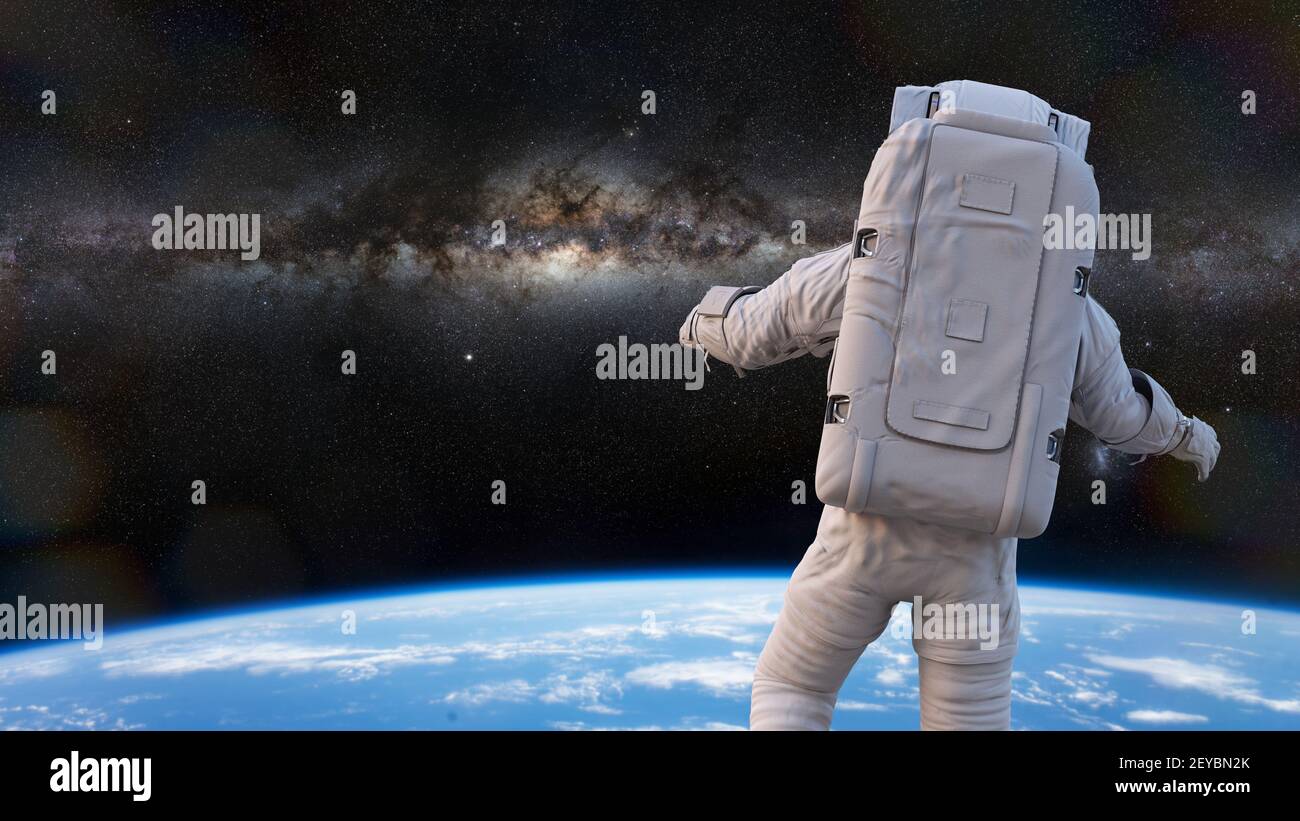 astronaut in front of planet Earth Stock Photo - Alamy