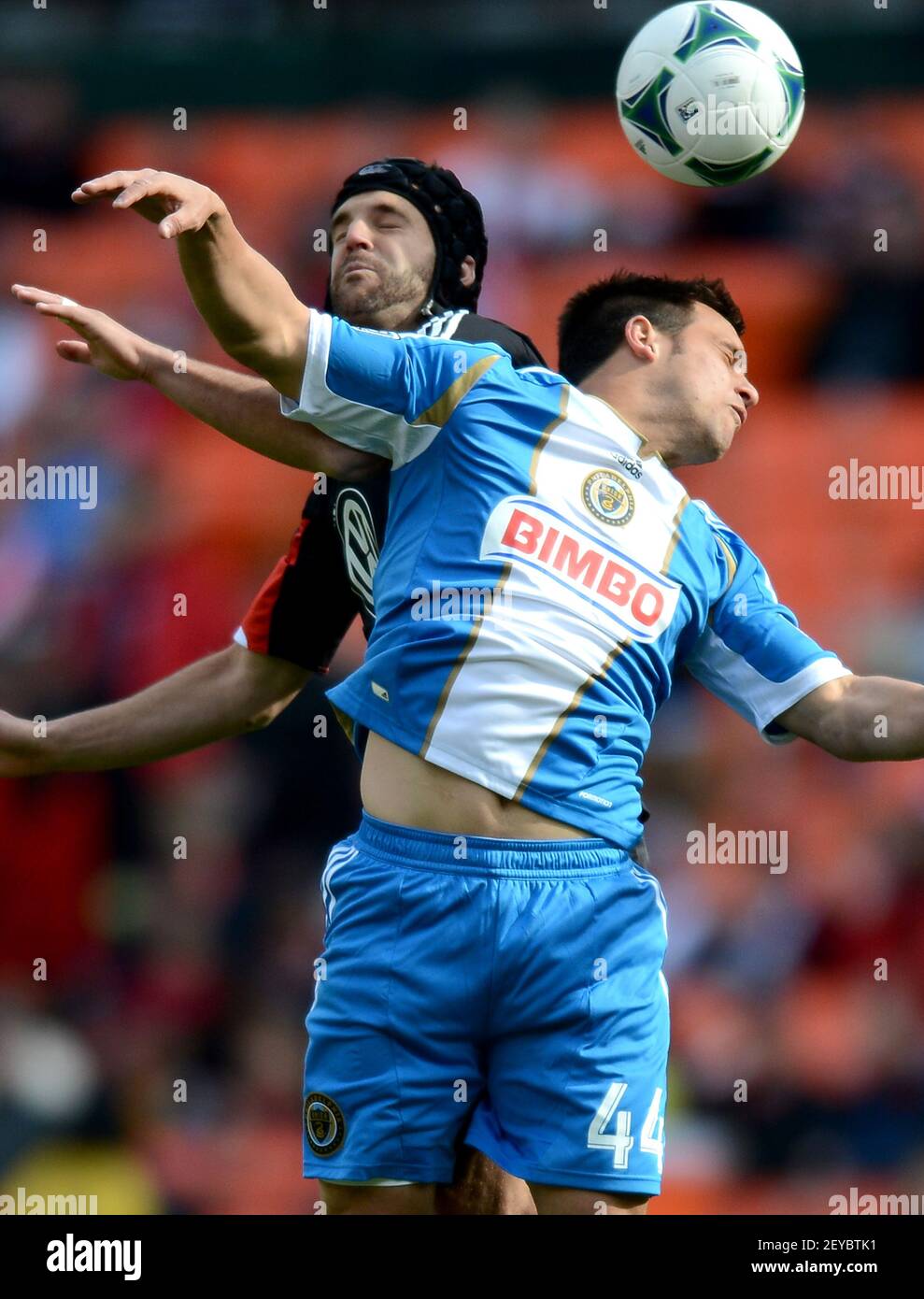 D.C. United defender Daniel Woolard (21), back, and Philadelphia Union ...