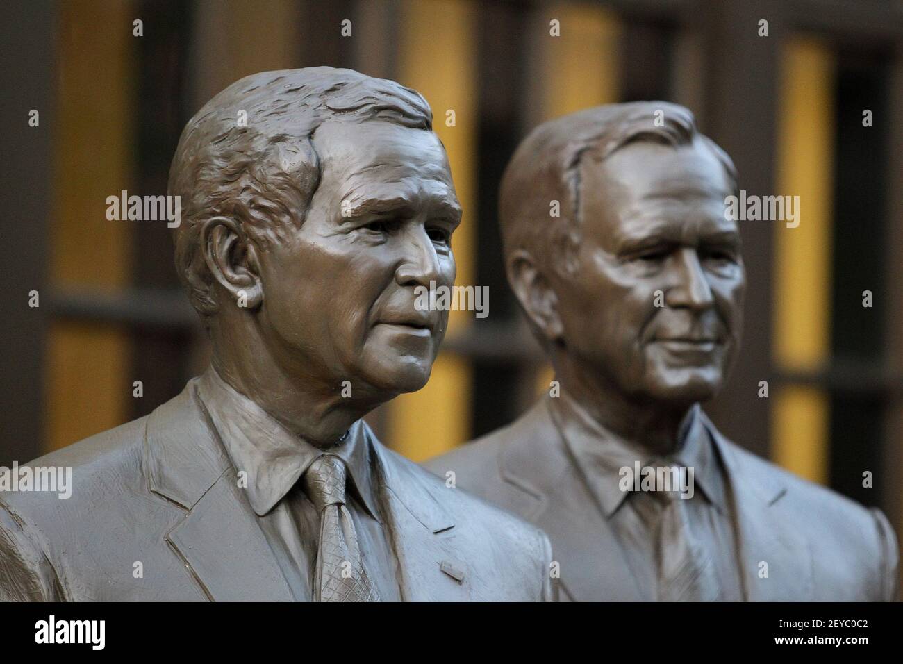 Two bronze statues of former United States Presidents George W. and his ...