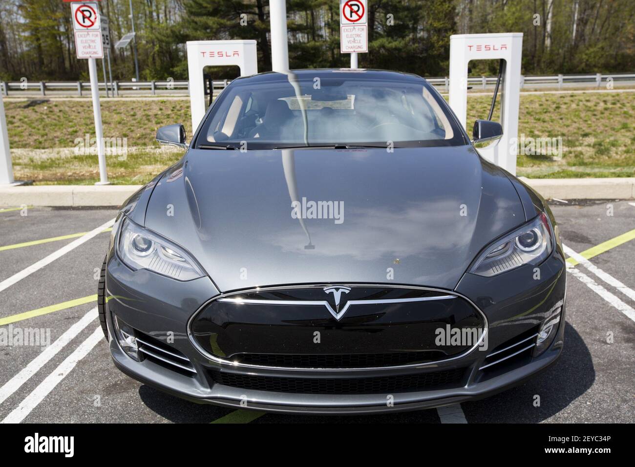 A Tesla Model S electric vehicle at a Tesla Supercharging Station along ...