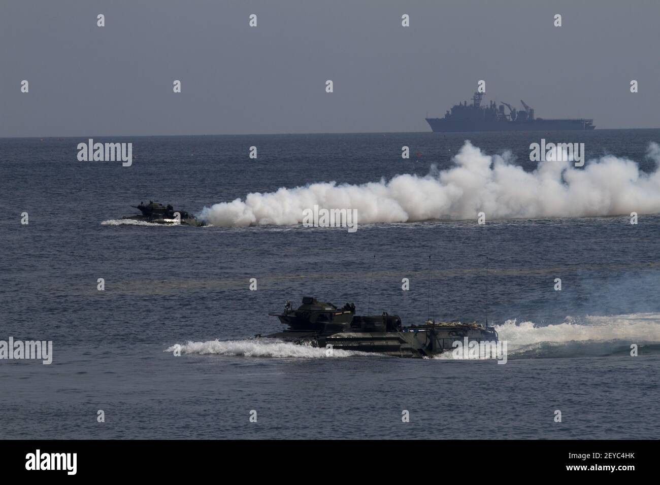 South Korean Marine LVT-7 landing craft sail to shores in a smoke ...